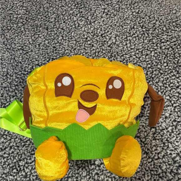 Disney | Accessories | Disney Pluto Munchlings Sunflower Plush Backpack ...